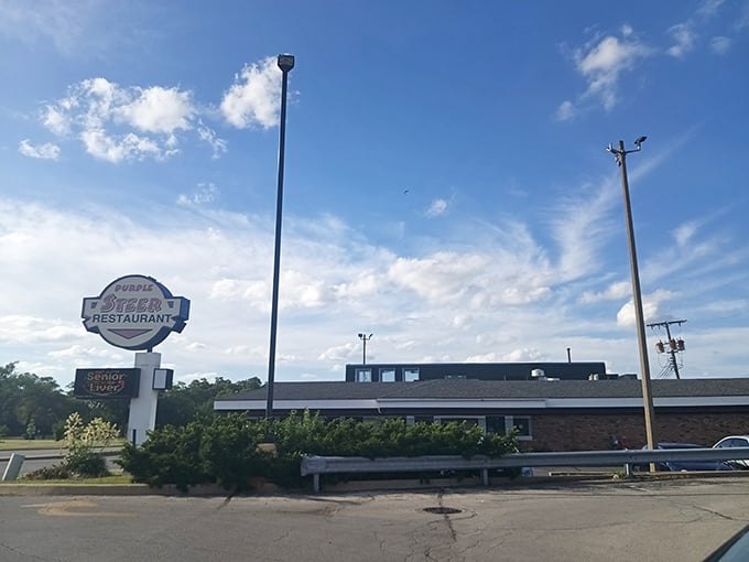 The Purple Steer's iconic sign has guided hungry travelers to comfort food heaven since before Instagram could make restaurants famous.