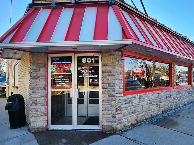 Ray's Diner's distinctive stone and red-striped exterior promises comfort food that sticks to your ribs. The kind of place where breakfast dreams come true.