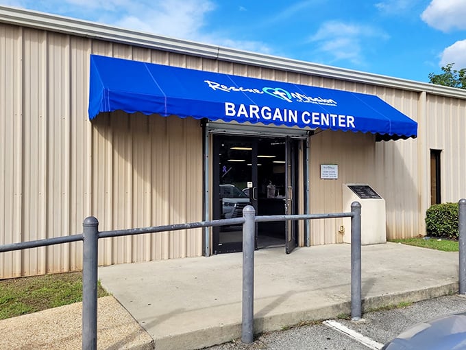 The Rescue Mission's bright blue awning beckons like a flag signaling "bargains ahead" to savvy shoppers.