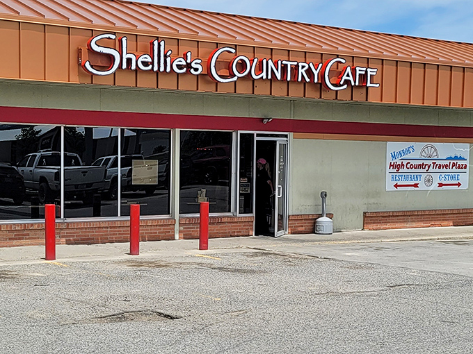 That bold red-orange roof isn't just eye-catching &ndash; it's a beacon for hungry travelers seeking serious country cooking.