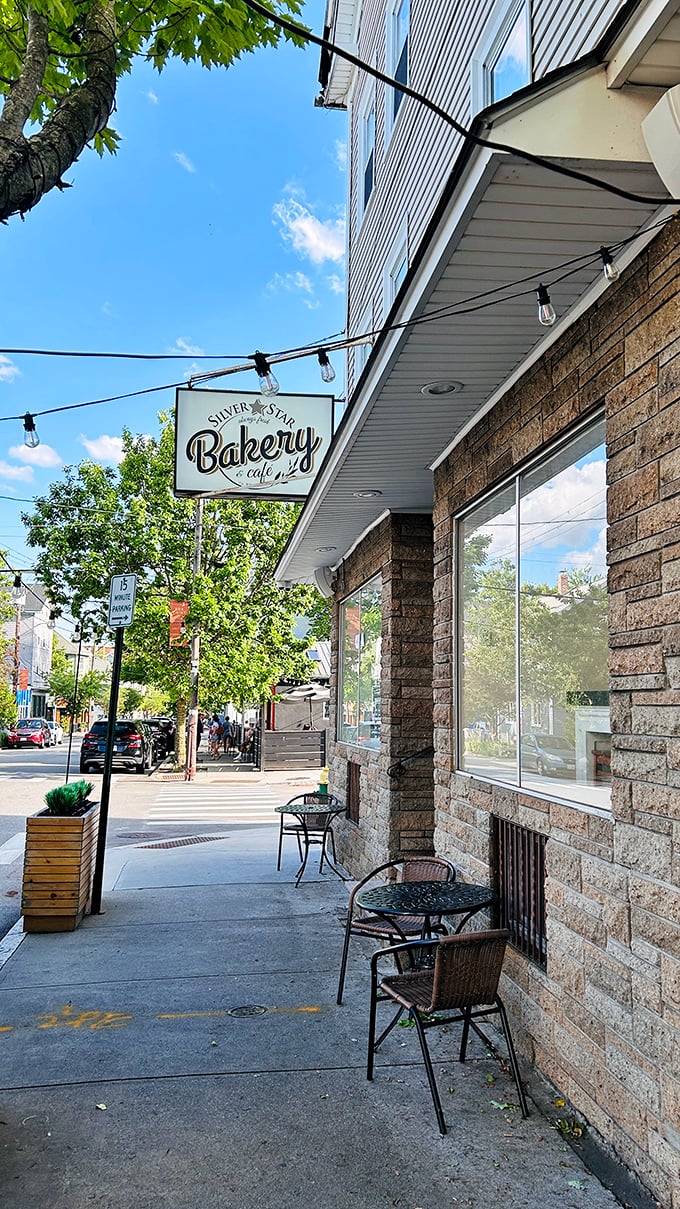 Silver Star's simple sign swinging in the breeze - the bat signal for Portuguese sweet bread lovers everywhere.