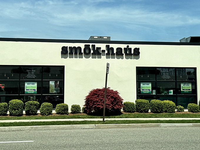 Modern meets mouthwatering at this roadside gem! Smok-haus's clean lines and black lettering hide a world where smoke transforms ordinary meat into extraordinary memories.