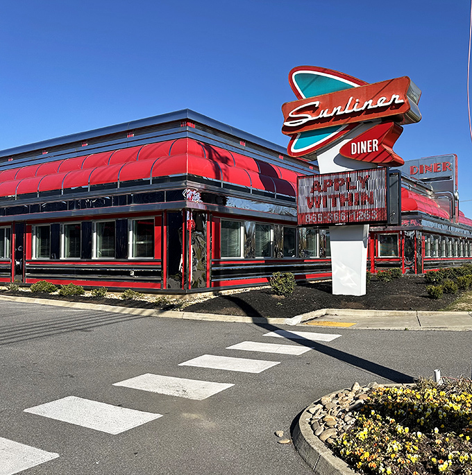 The Sunliner's gleaming red exterior and retro signage transport you to a time when breakfast was an event.