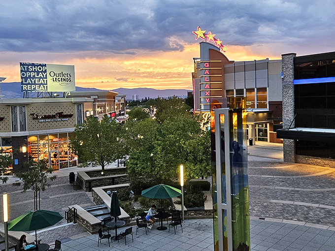 The Outlets at Legends rises like a shopping cathedral where great deals come to pray for salvation.