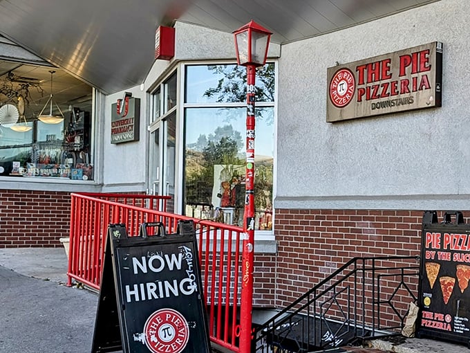 The Pie Pizzeria's red-railed entrance is like the gateway to an underground pizza speakeasy. Password: "Extra cheese, please."