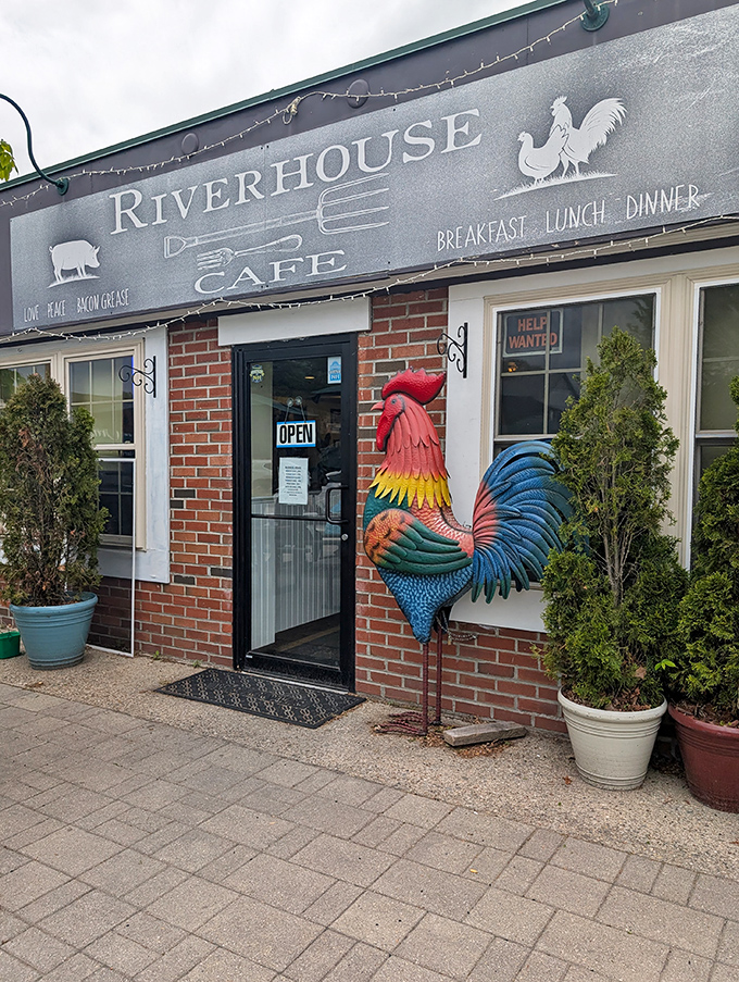 The Riverhouse Caf&eacute;'s colorful rooster mural announces "serious breakfast happens here" with artistic flair and folksy charm.