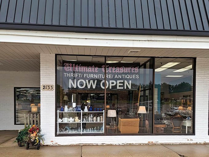 Ultimate Treasures lives up to its name with a pristine storefront showcasing carefully arranged lamps and furniture in the window.