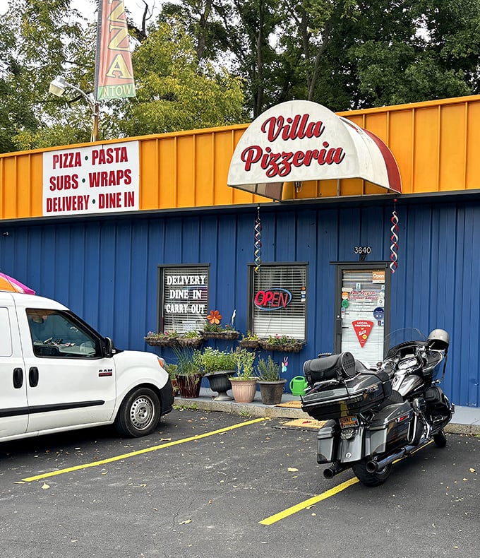 That cheerful yellow and blue exterior promises the kind of comfort food that makes small towns feel like home.