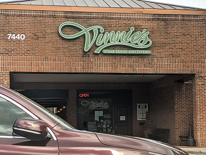 Vinnie's glowing sign beckons like a lighthouse guiding hungry sailors to beefy shores.