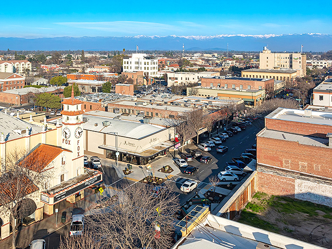 Visalia's charming downtown invites you to stroll past the historic cinema, where the curved tower has watched over generations.