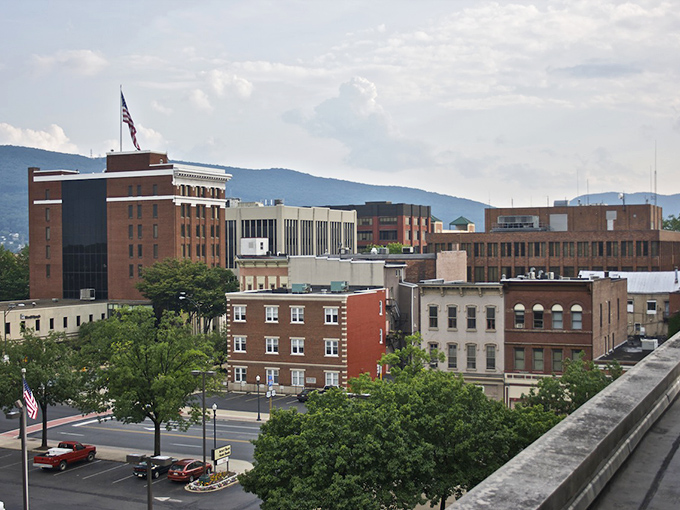 Williamsport's downtown skyline showcases historic brick buildings beneath blue skies &ndash; affordable retirement with character to spare.