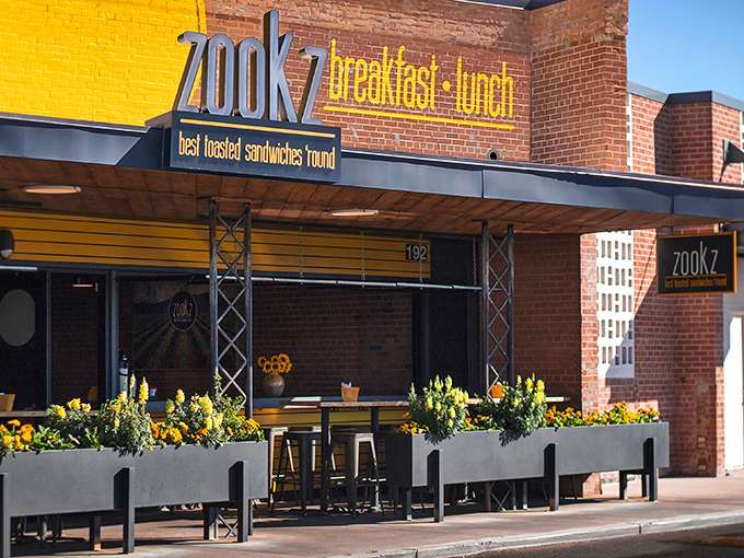 Zookz's cheerful yellow and brick facade stands out like sunshine in a bottle. Their round sandwiches are equally bright!