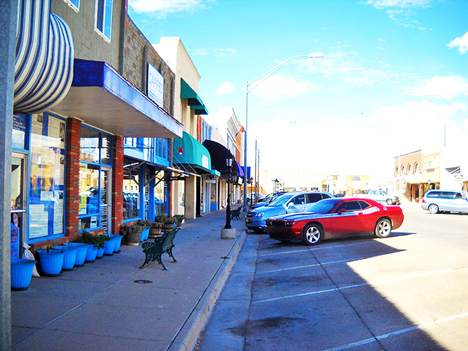 Alamogordo's colorful storefronts with their cheerful awnings welcome window shoppers. That bench is practically begging you to sit awhile.