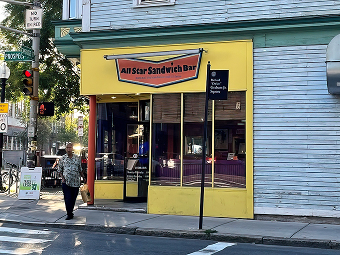 The cheerful awnings of All Star Sandwich Bar promise creative sandwich adventures. Your taste buds will thank you.