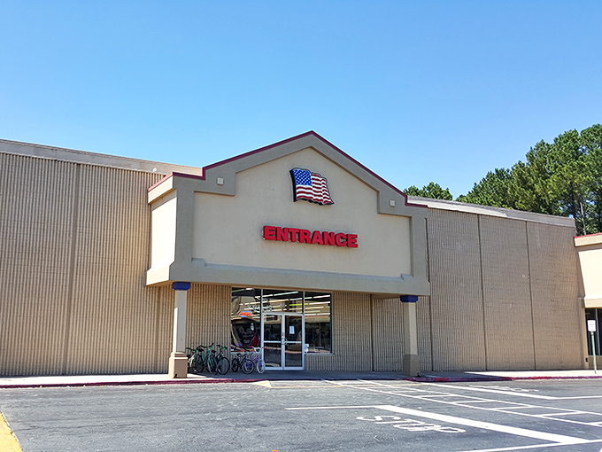 The American flag proudly flies above this secondhand superstore. Your wallet will salute the savings inside!
