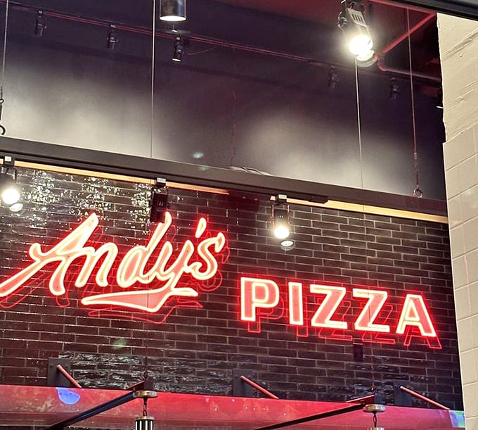 Inside Andy's, industrial chic meets comfort food magic, creating the perfect atmosphere for pizza worship sessions. 