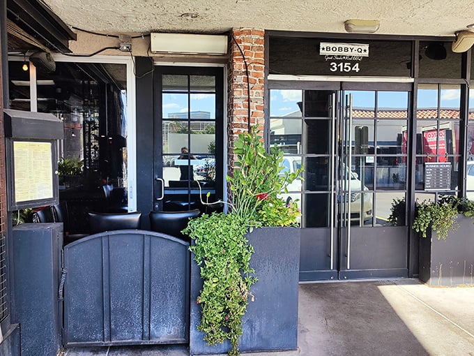 The brick and glass entrance hints at Bobby-Q's upscale-casual vibe, where BBQ gets the respect it deserves.