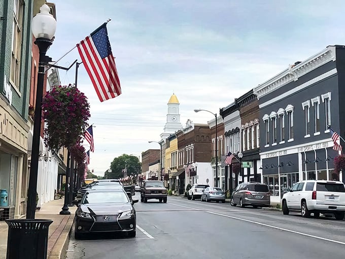 American flags flutter above Campbellsville's streets, signaling both patriotism and prices that won't declare war on your retirement savings. Salute the savings!