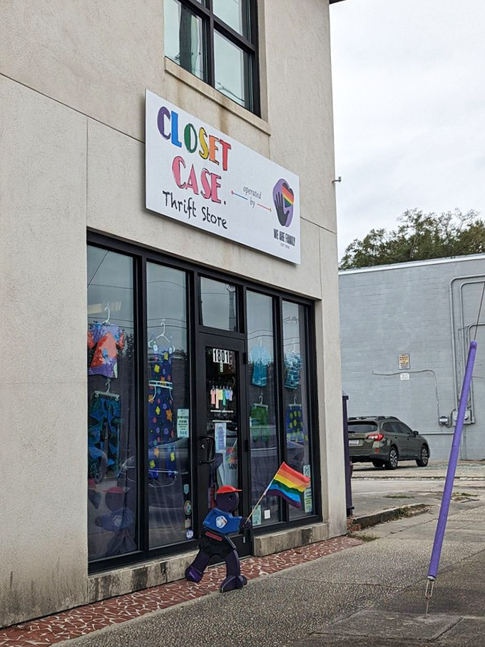 Window displays featuring adorable children's clothes hint at the curated treasures waiting inside this inclusive space.