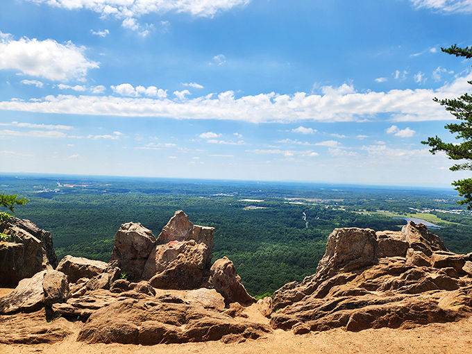 The summit rewards climbers with views that stretch beyond the horizon's edge.