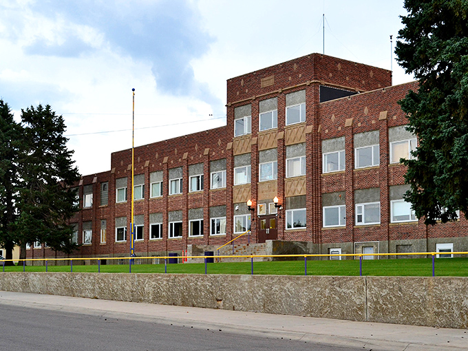 This no-nonsense brick schoolhouse in Cut Bank has educated generations of Montanans, standing solid against both prairie winds and changing times.