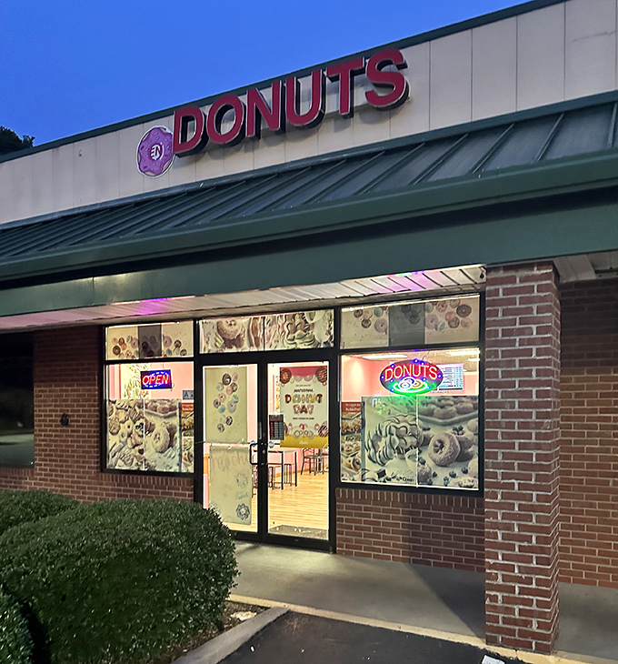 The glowing windows at dusk reveal display cases full of golden treasures waiting for tomorrow's lucky customers.