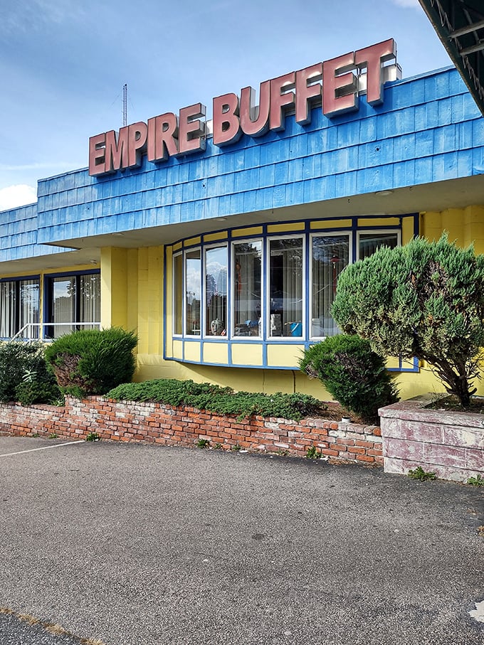 The bold red lettering against that blue facade promises imperial feasting fit for royalty.