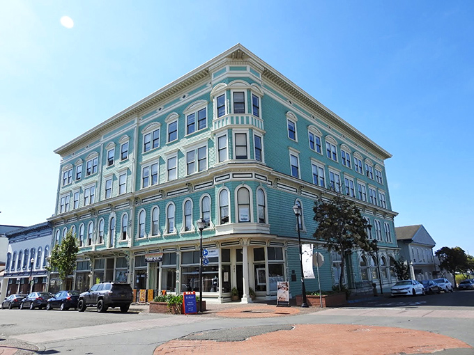 This turquoise Victorian beauty stands like a grand dame dressed for afternoon tea, proving historic can also mean gorgeous.