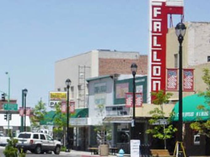 The Fallon sign stands tall, a beacon for travelers seeking small-town authenticity in a supersized world.