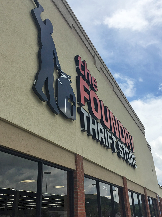 Where every purchase hammers out hope. The Foundry's bold signage marks the spot for furniture finds and second chances.