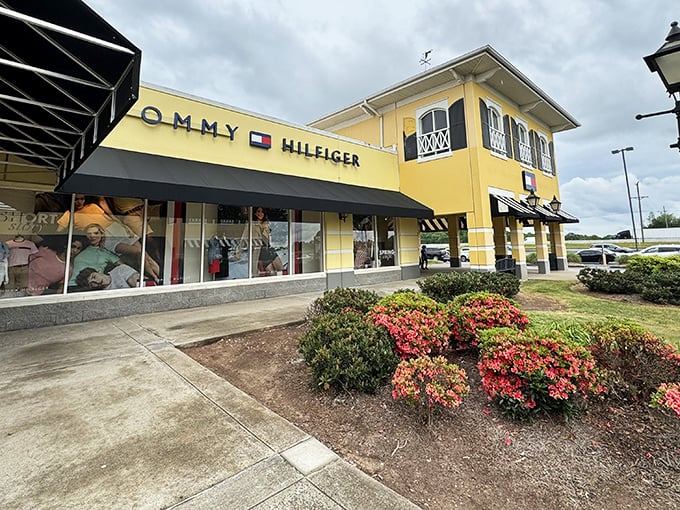 Tommy Hilfiger's bold storefront promises nautical-inspired fashion at landlubber prices. Anchors aweigh for savings!