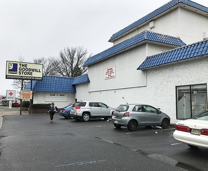 The architectural flair makes this donation center stand out from the strip mall crowd. That blue roof has sheltered countless shopping adventures.