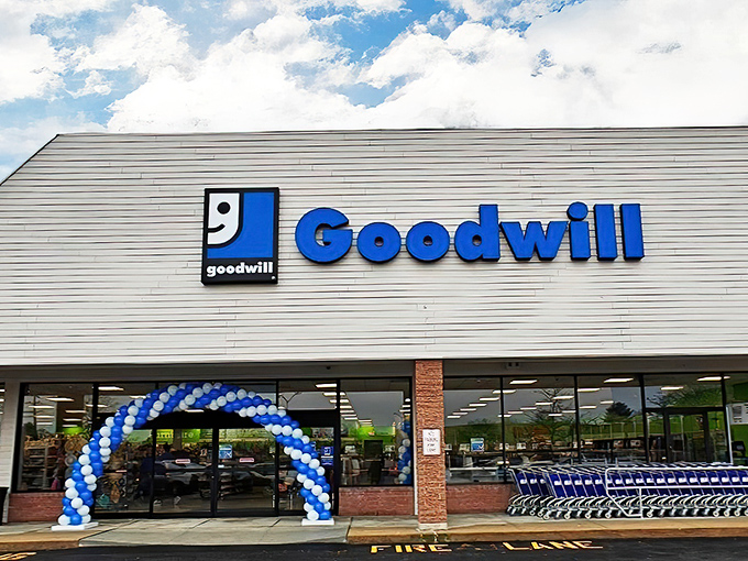 Grand opening excitement! Goodwill's blue balloon arch welcomes shoppers to a world of organized treasures and unexpected finds.