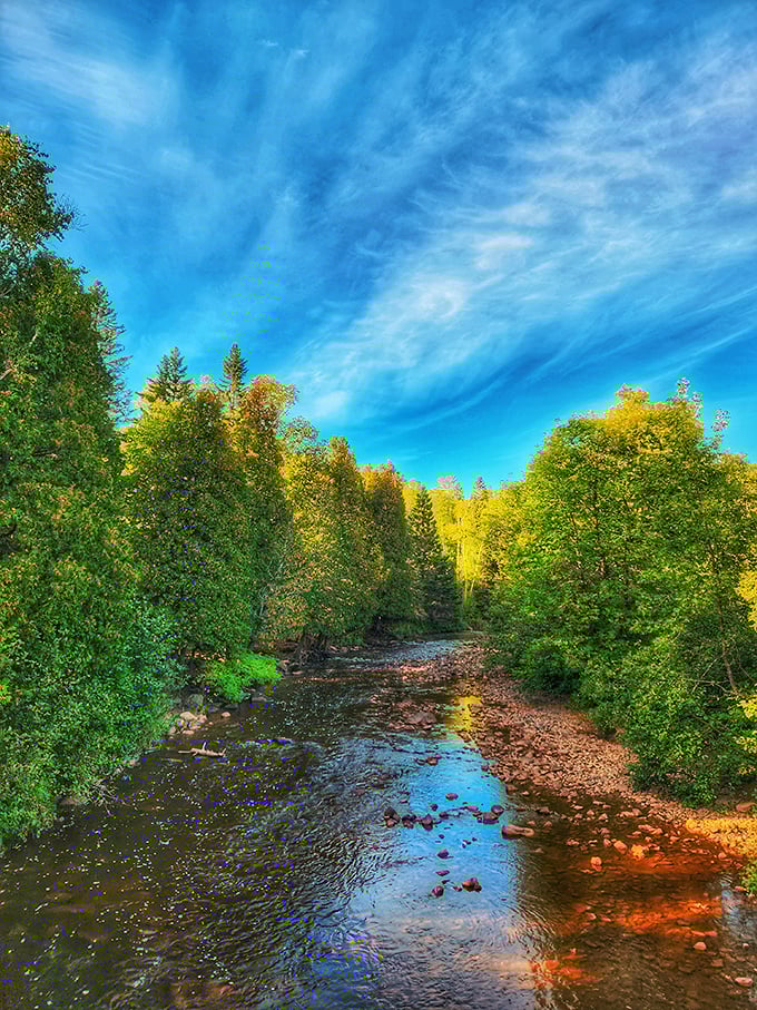 The smooth flow of Gooseberry Falls hypnotizes visitors like nature's version of those relaxation videos your nephew keeps watching online.