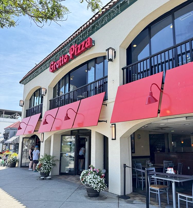 Two stories of pizza paradise right on the boardwalk &ndash; generations have walked through those pink awnings craving cheese and sauce.