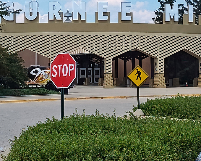Even the stop signs can't deter eager shoppers from making their pilgrimage to Gurnee Mills, Illinois' temple of retail therapy.