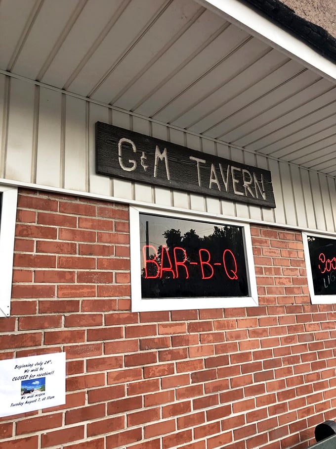 The humble exterior of Guy & Mae's Tavern belies the flavor explosion waiting inside. That BAR-B-Q sign is basically a beacon of deliciousness.