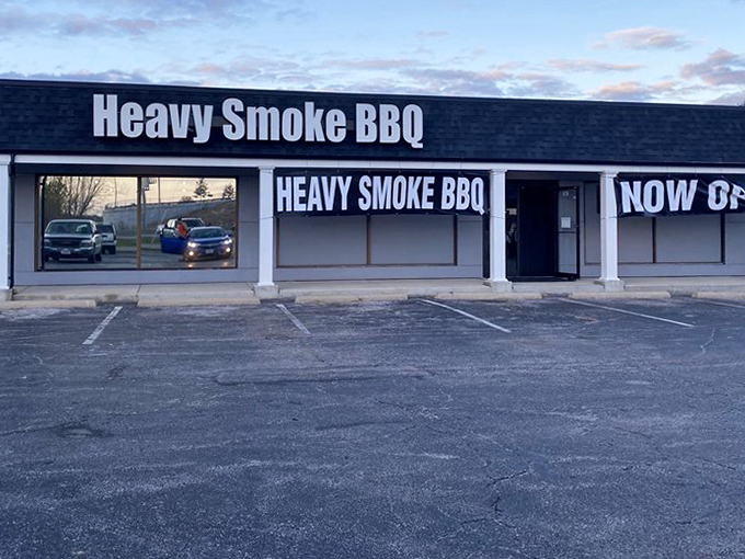 Dawn or dusk, Heavy Smoke BBQ's simple storefront promises the same thing: barbecue worth clearing your schedule for.
