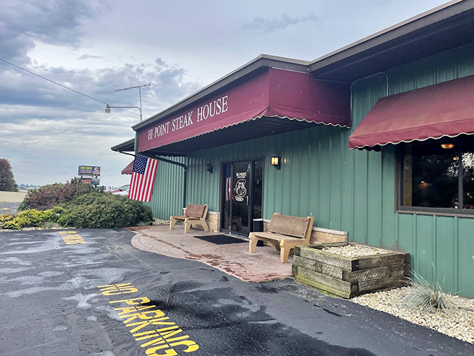 The American flag flies proudly outside Hi Point, where steak is practically a patriotic duty. Those wooden benches have heard many satisfied sighs.
