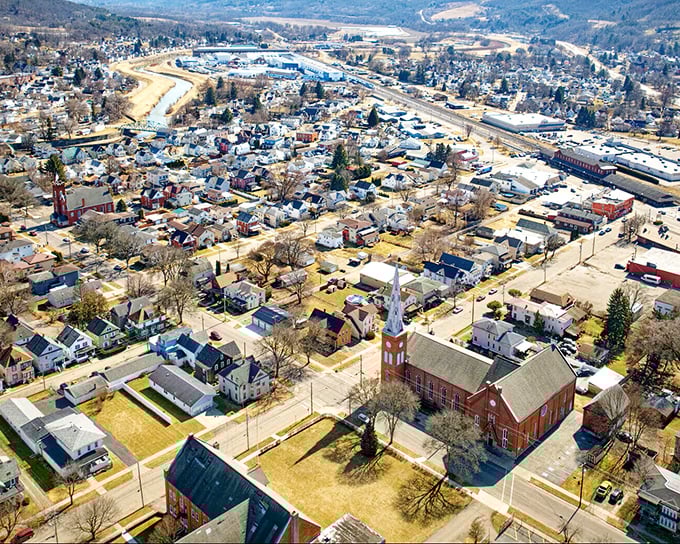From this bird's-eye view, Hornell spreads out like a model train village, complete with church steeple and neighborhoods where mortgage payments don't require a second job.