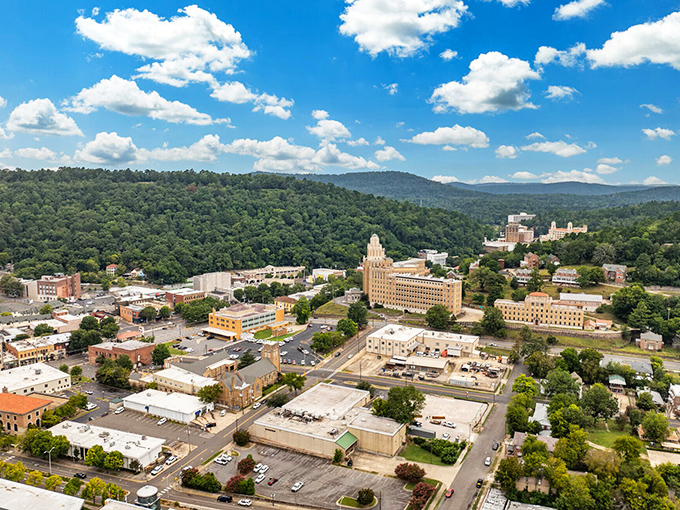 Hot Springs' historic downtown basks in golden sunset light, transforming brick buildings into a warm tableau of small-town Americana.