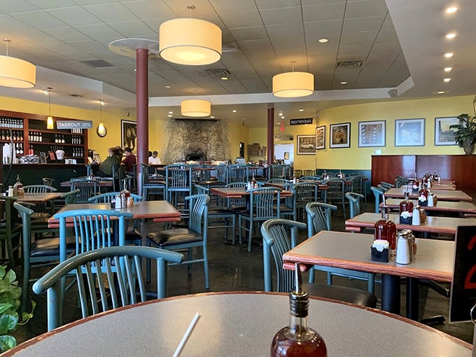 The dining room at Il Vicino buzzes with happy eaters. That wood-fired oven in the back is the real star of the show.