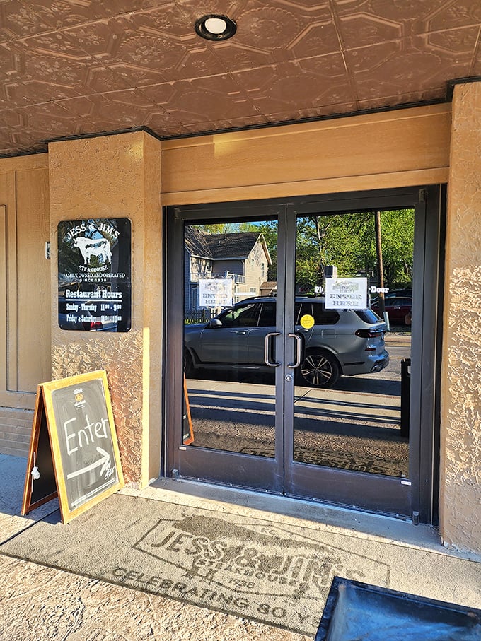 Step through these doors and join the club of Kansas Citians who know where real steak lives. The embossed entrance says it all.