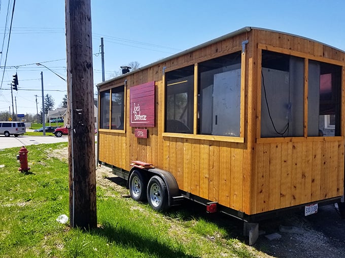 This wooden BBQ trailer might look simple, but the magic happening inside is anything but basic.