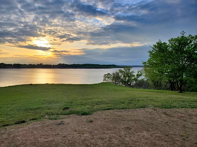 Sunset spectacular at Kanopolis Lake. Those colors dancing across the water make even amateur photographers look like pros.