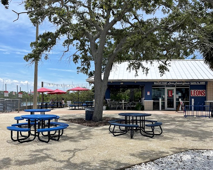 Picnic tables under Florida oaks create the perfect setting for lobster roll perfection.