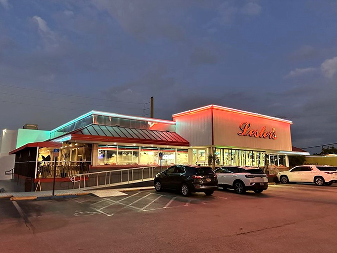 As night falls, Lester's neon glow becomes a beacon for night owls and early birds alike, promising pancakes that don't care what time it is.