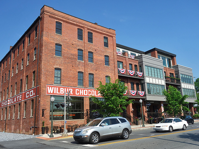 The historic Wilbur Chocolate building stands as Lititz's sweet landmark, where the aroma of cocoa has perfumed the streets for generations.