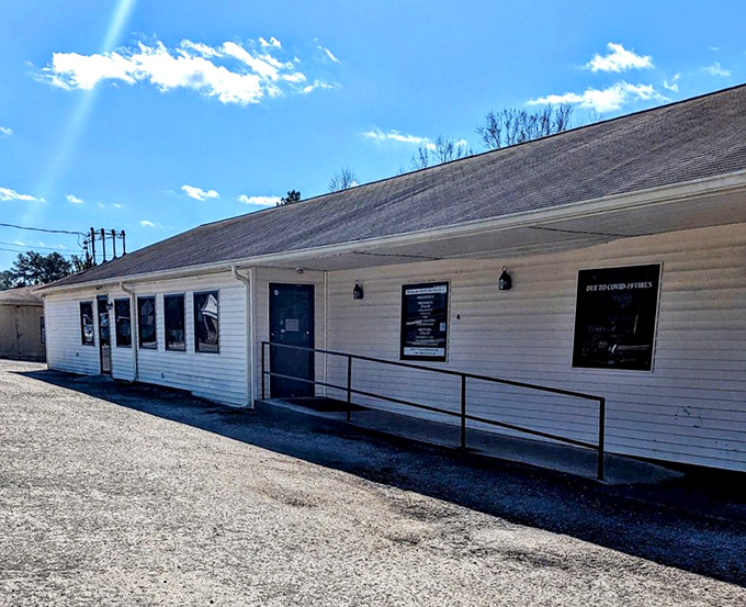 This unassuming white building proves that the best BBQ often hides behind the most humble facades and honest exteriors.
