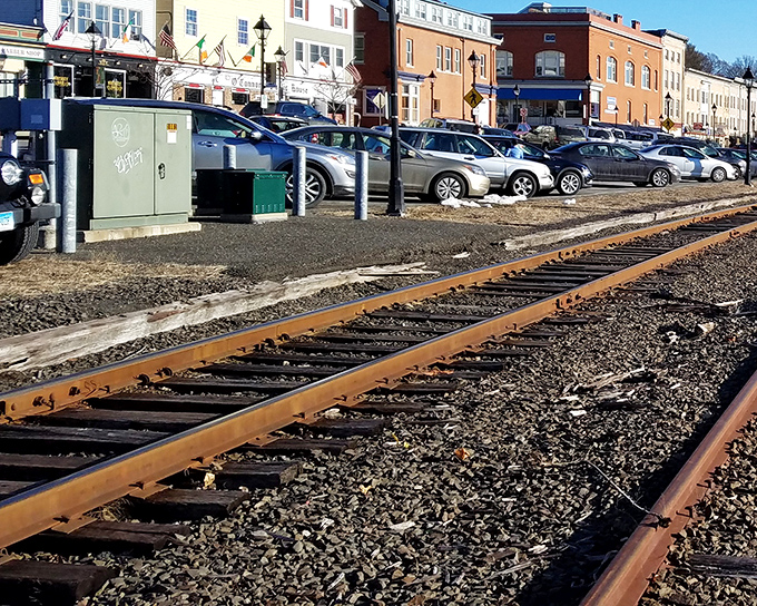 New Milford's train tracks run through town like a nostalgic reminder of when travel meant adventure, not airport security lines.
